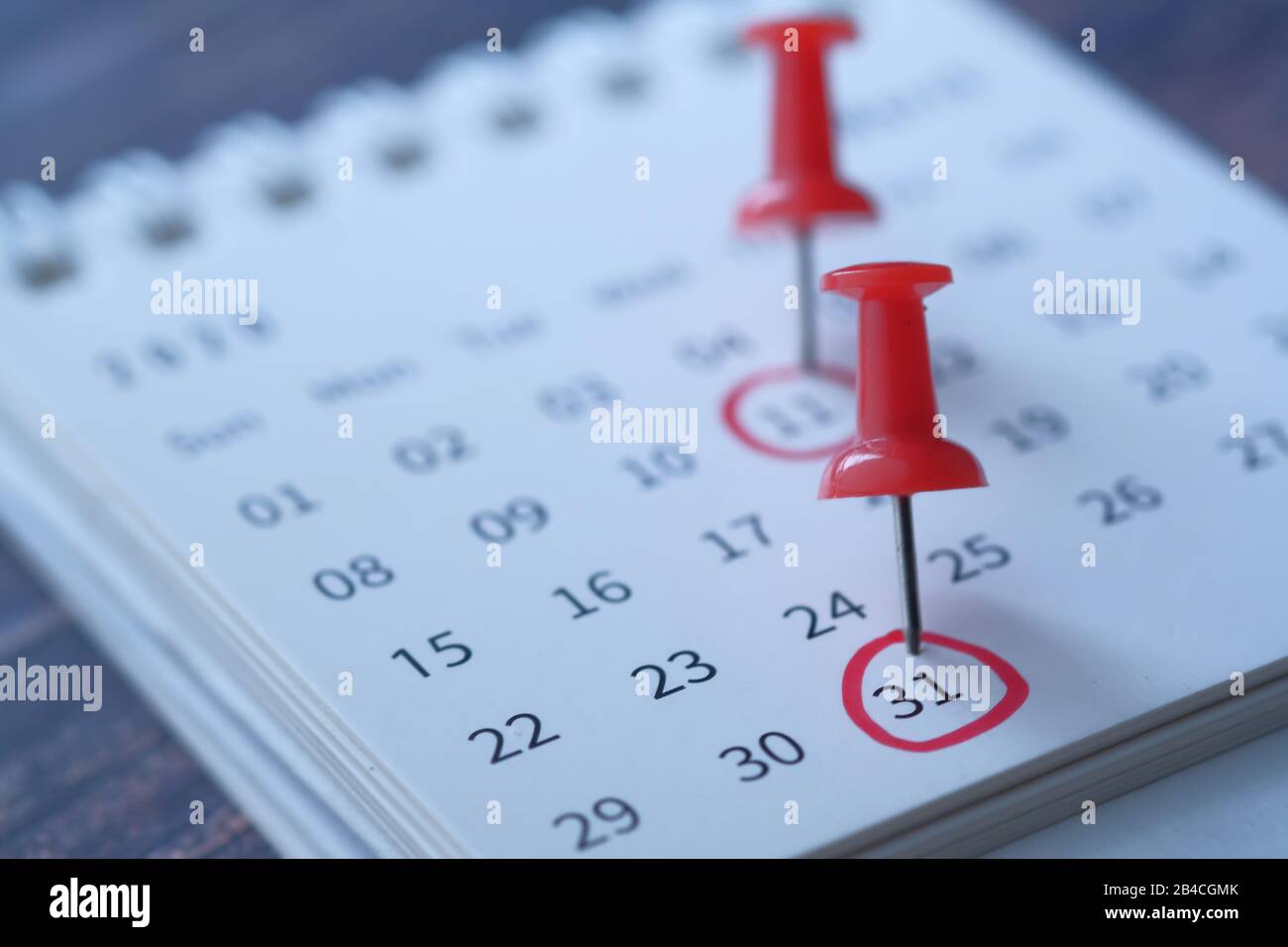 deadline concept with push pin on calendar date Stock Photo - Alamy