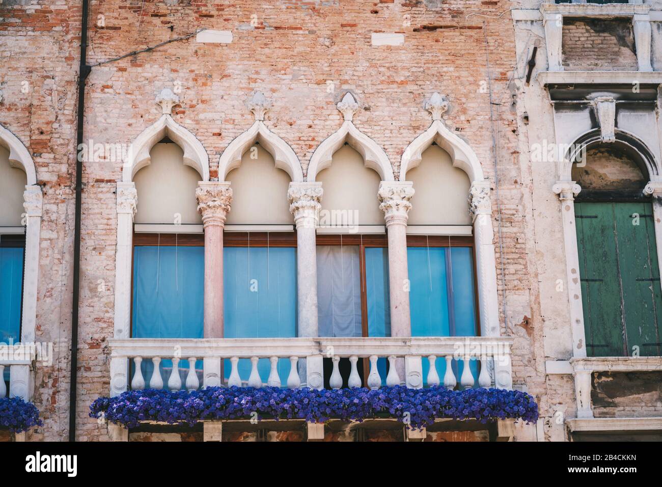 Facade of old house with windows on the street in Venice Italy Stock ...