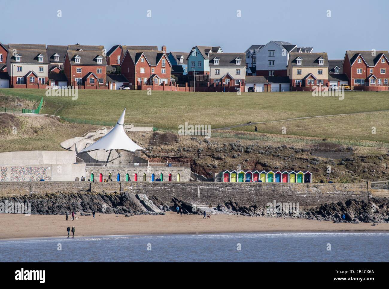 Whitmore Bay on Barry Island south Wales with new housing behind, south ...