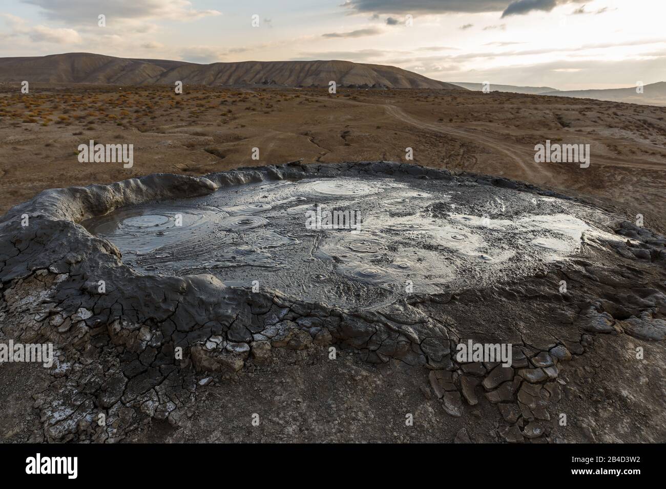 mud volcano crater, Gobustan near Baku Azerbaijan Stock Photo - Alamy