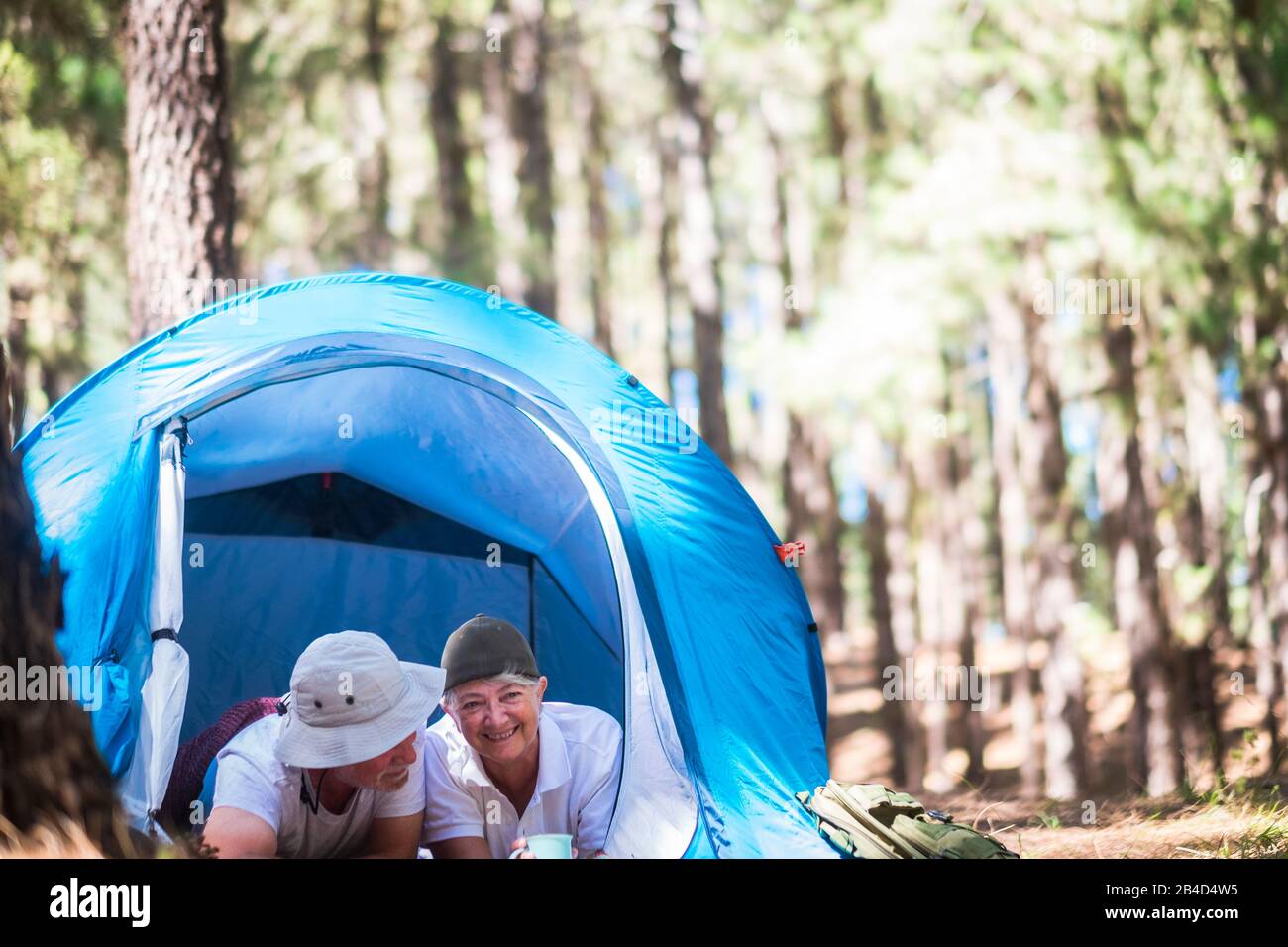 Happy retired senior caucasian couple enjoying the outdoor leisure ...