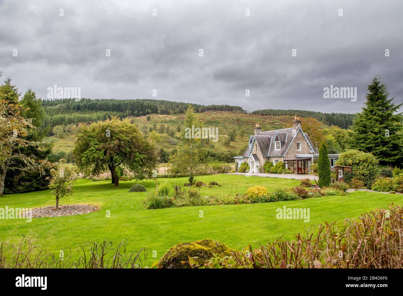 beautiful old house in scotland with nice garden Stock Photo - Alamy