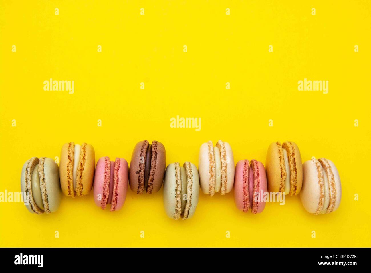 Colorful abstract background with traditional french macaroons cookies ...