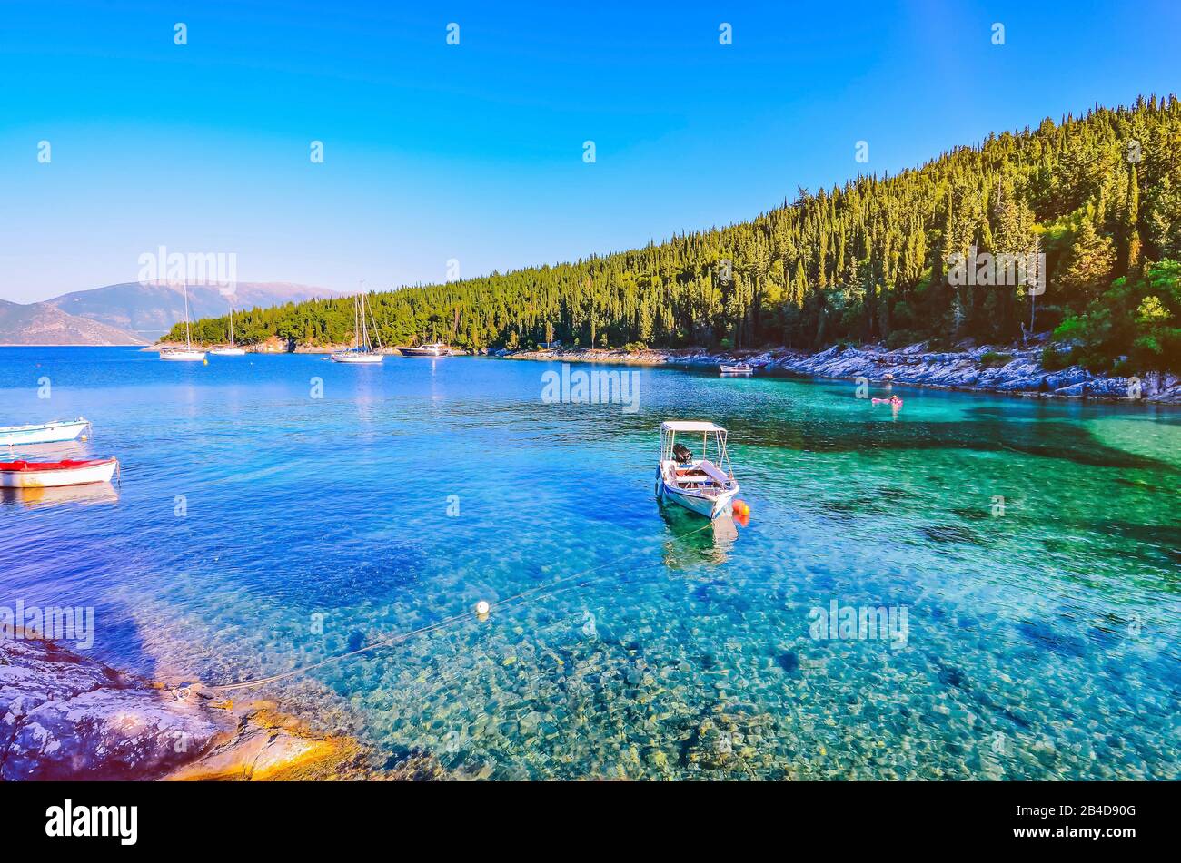 Quiet and idyllic beach of Foki Fiskardo with crystal clear water ...