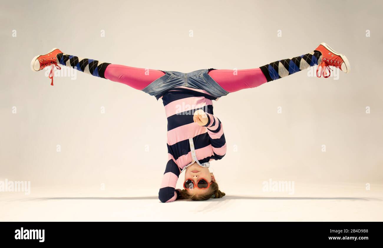 girl in a unique breakdance position,unique kid,crazy girl, cool girl ...