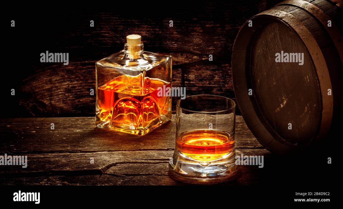Whiskey bottle and glass, whiskey cellar, whiskey barrels Stock Photo ...