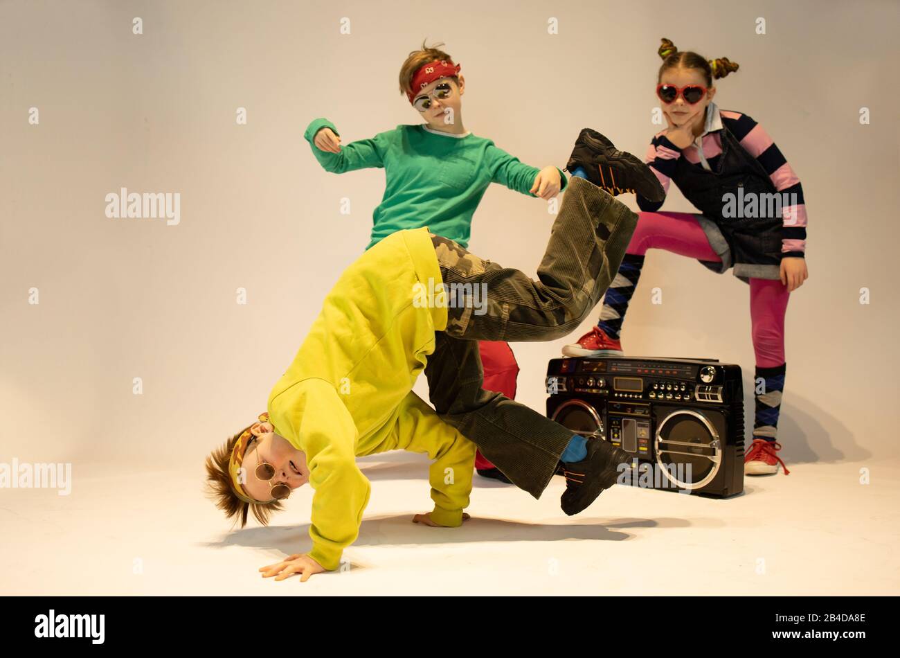 unique kids,cheerful children dressed in hip hop style,dancing kids ...