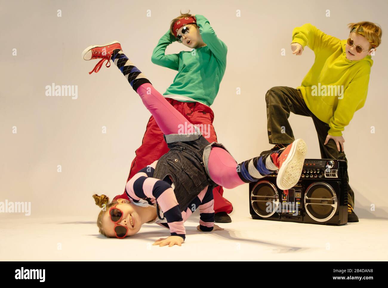 unique kids,cheerful children dressed in hip hop style,dancing kids ...