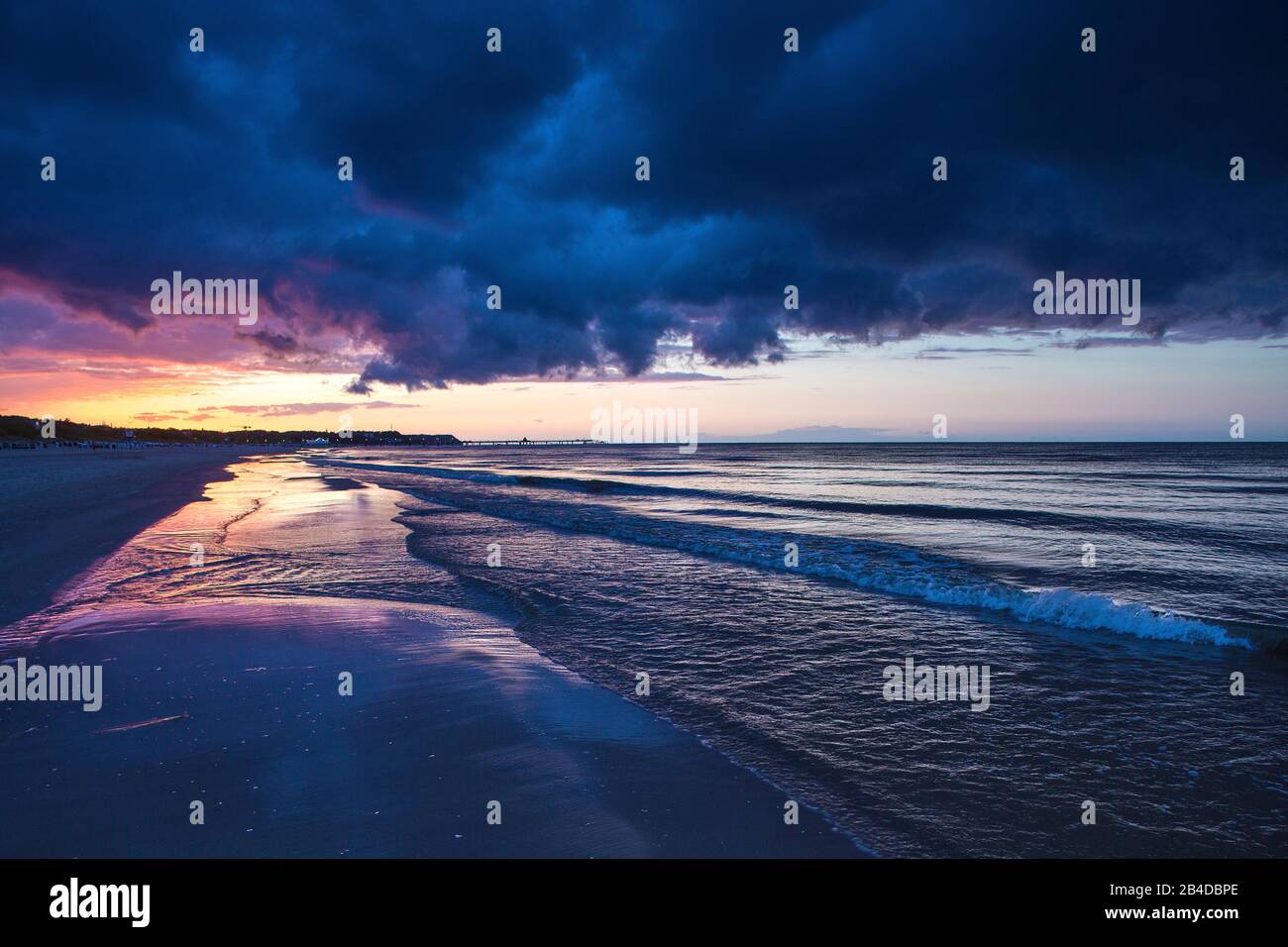 Beach with dramatic clouds on Usedom Stock Photo - Alamy