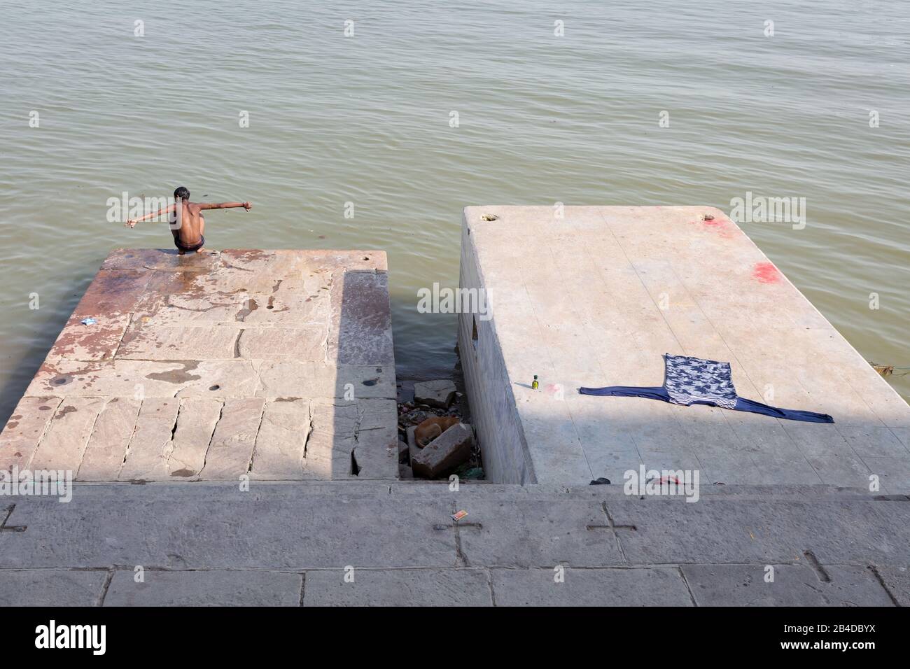 Indian boy in holy river hi-res stock photography and images - Alamy