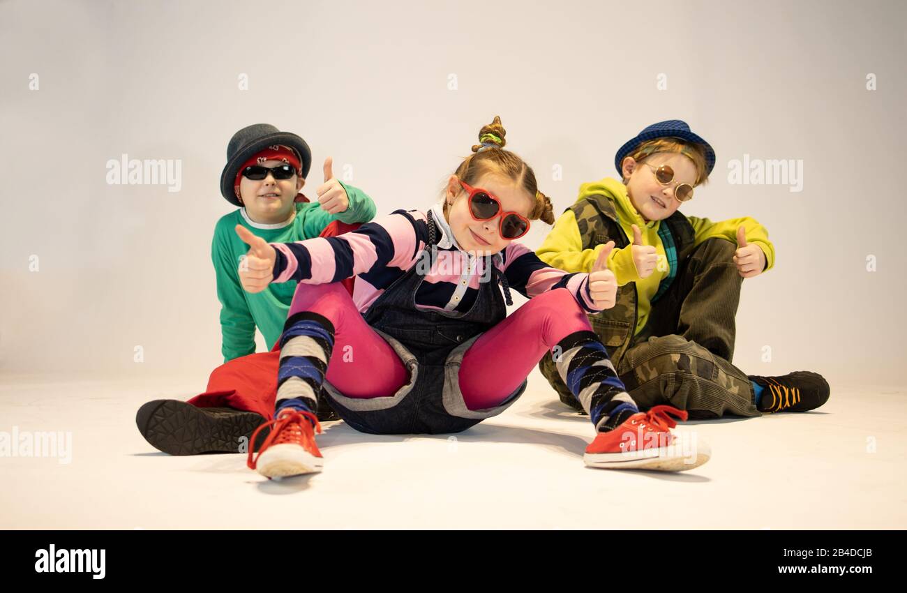 unique kids,cheerful children dressed in hip hop style,dancing kids ...