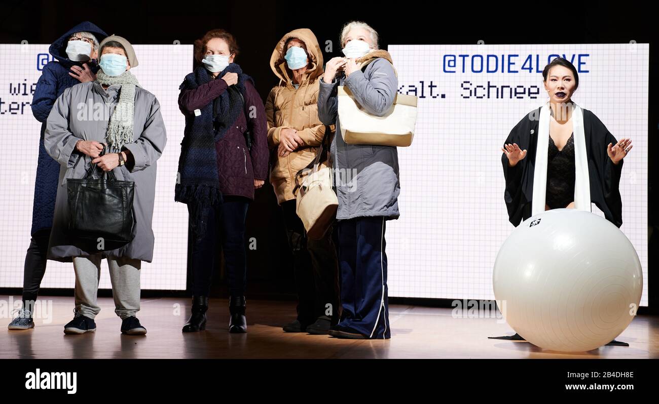 06 March 2020, Berlin: Theatre actress Yang Ge (r) plays in the photo ...