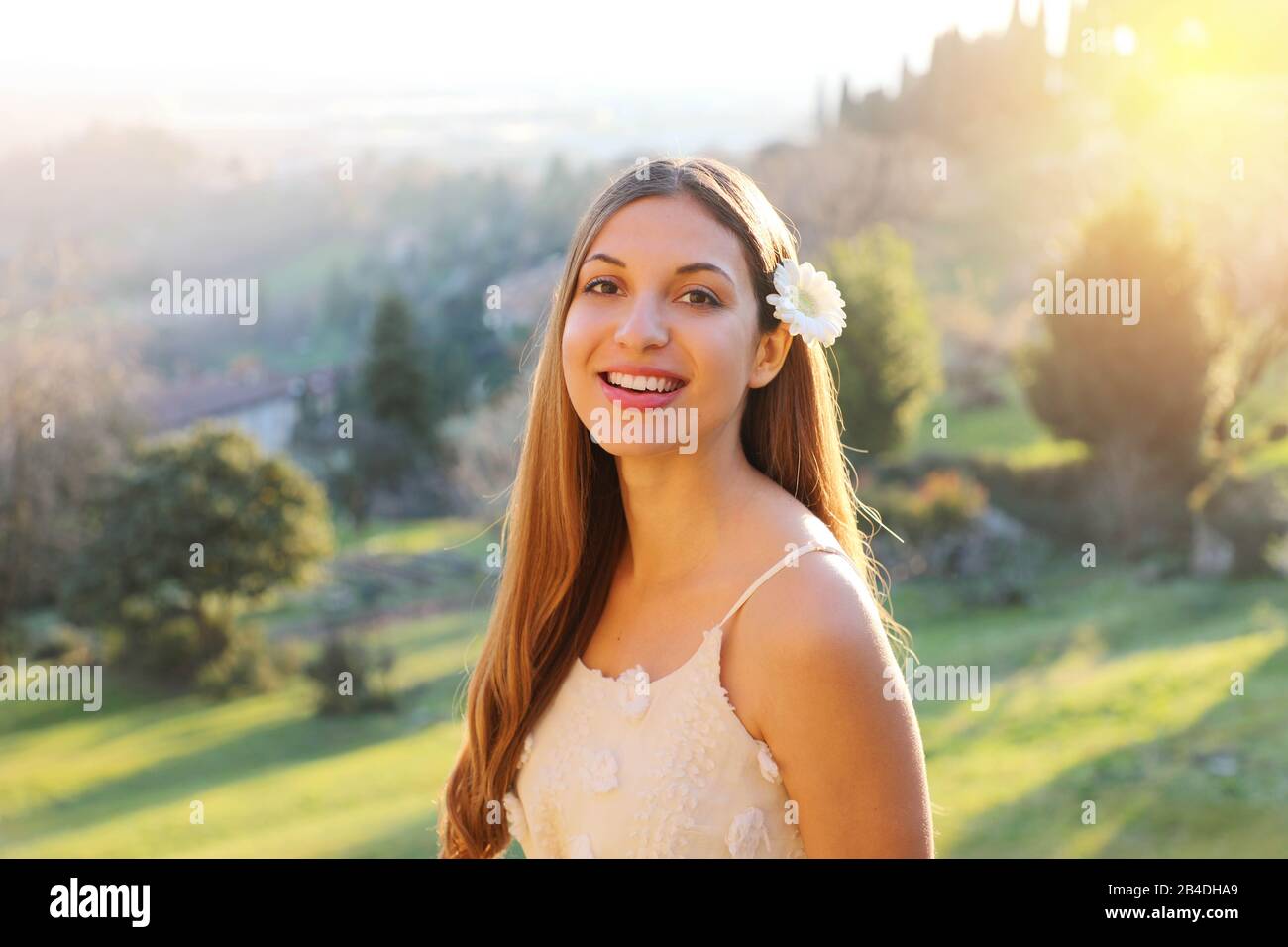 Charming young girl with shy smiling. Photo of beautiful young woman ...