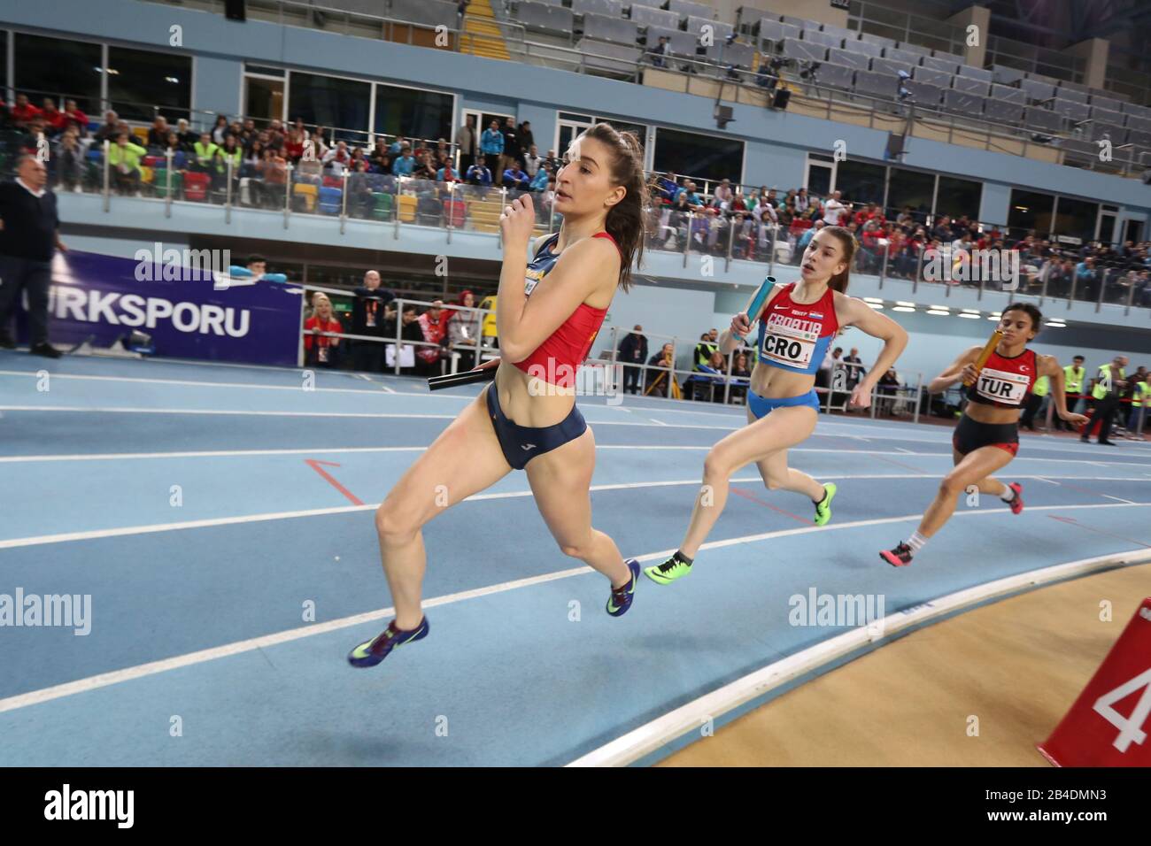 ISTANBUL, TURKEY - FEBRUARY 09, 2020: Athletes running 4x400 relay race ...