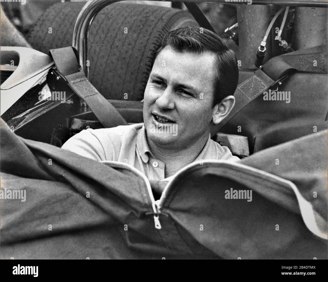 Bruce McLaren in his M6B Can-Am car before the race, which he won and ...