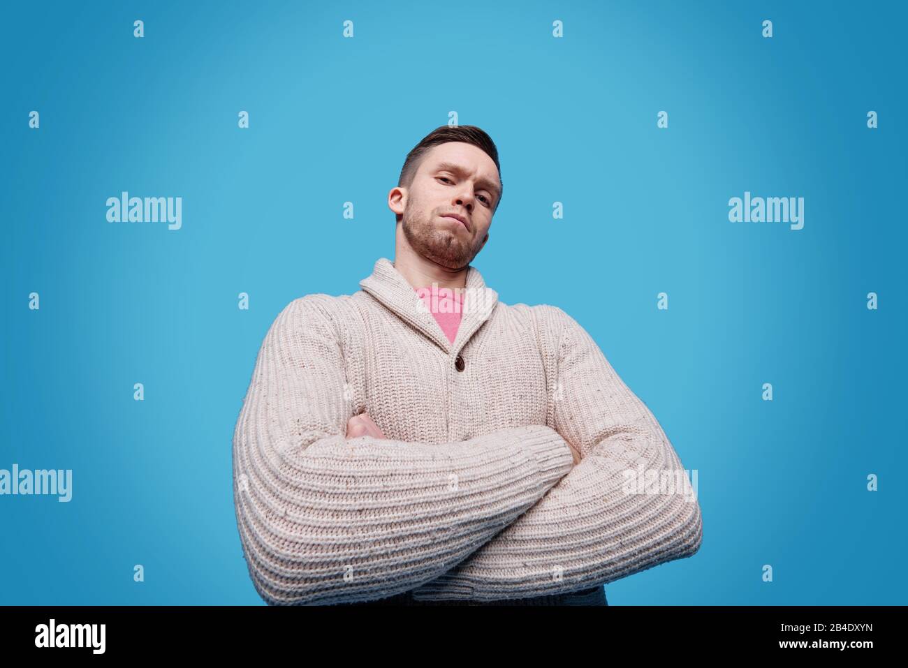Serious model crossing arms posing hi-res stock photography and images ...