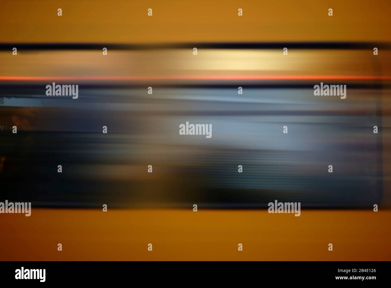 The abstract motion blur of a passing yellow train Stock Photo - Alamy
