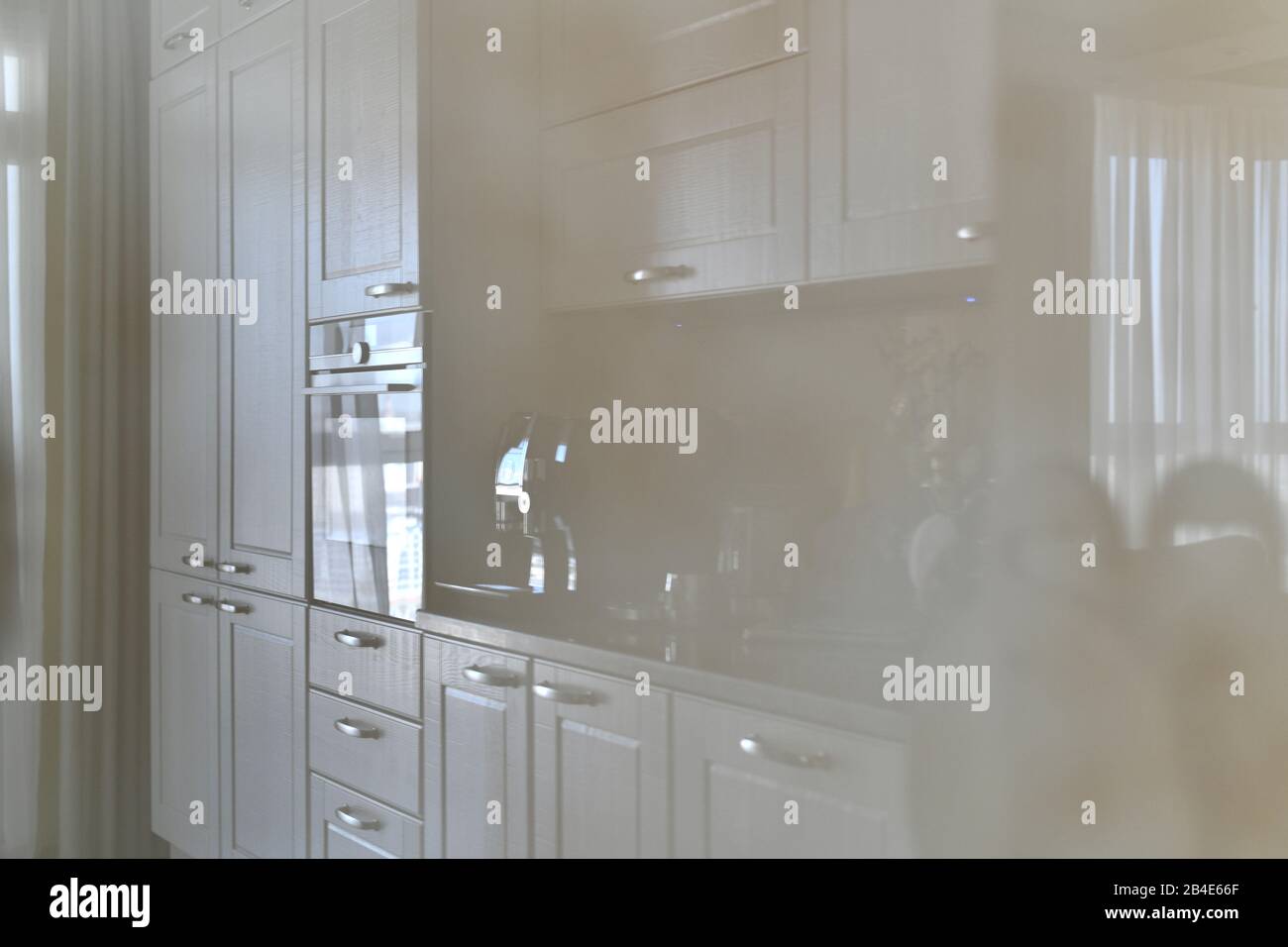 The background is reflected with the shroud of kitchen facade furniture ...