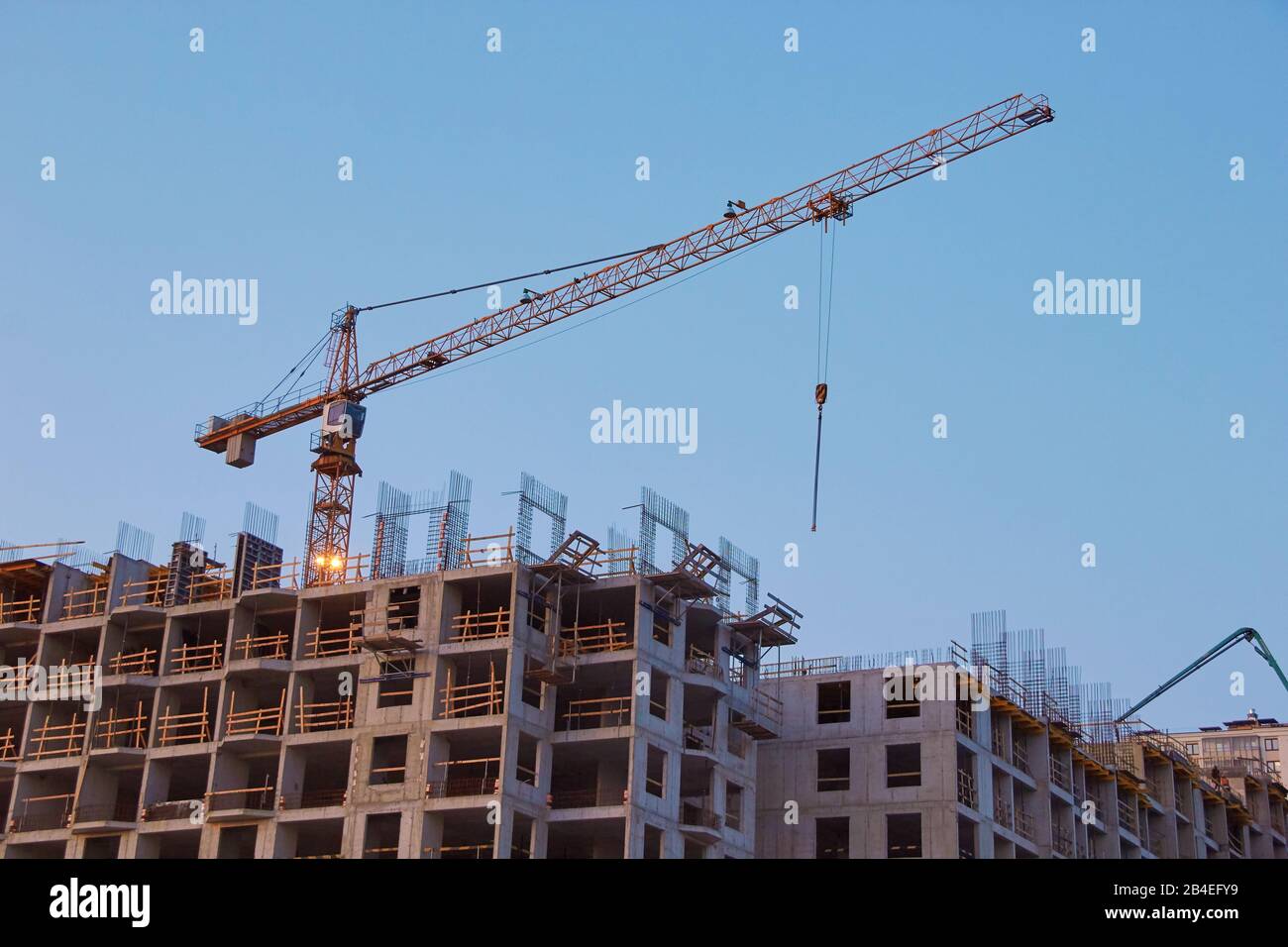 Industrial construction cranes the construction of an building Stock ...