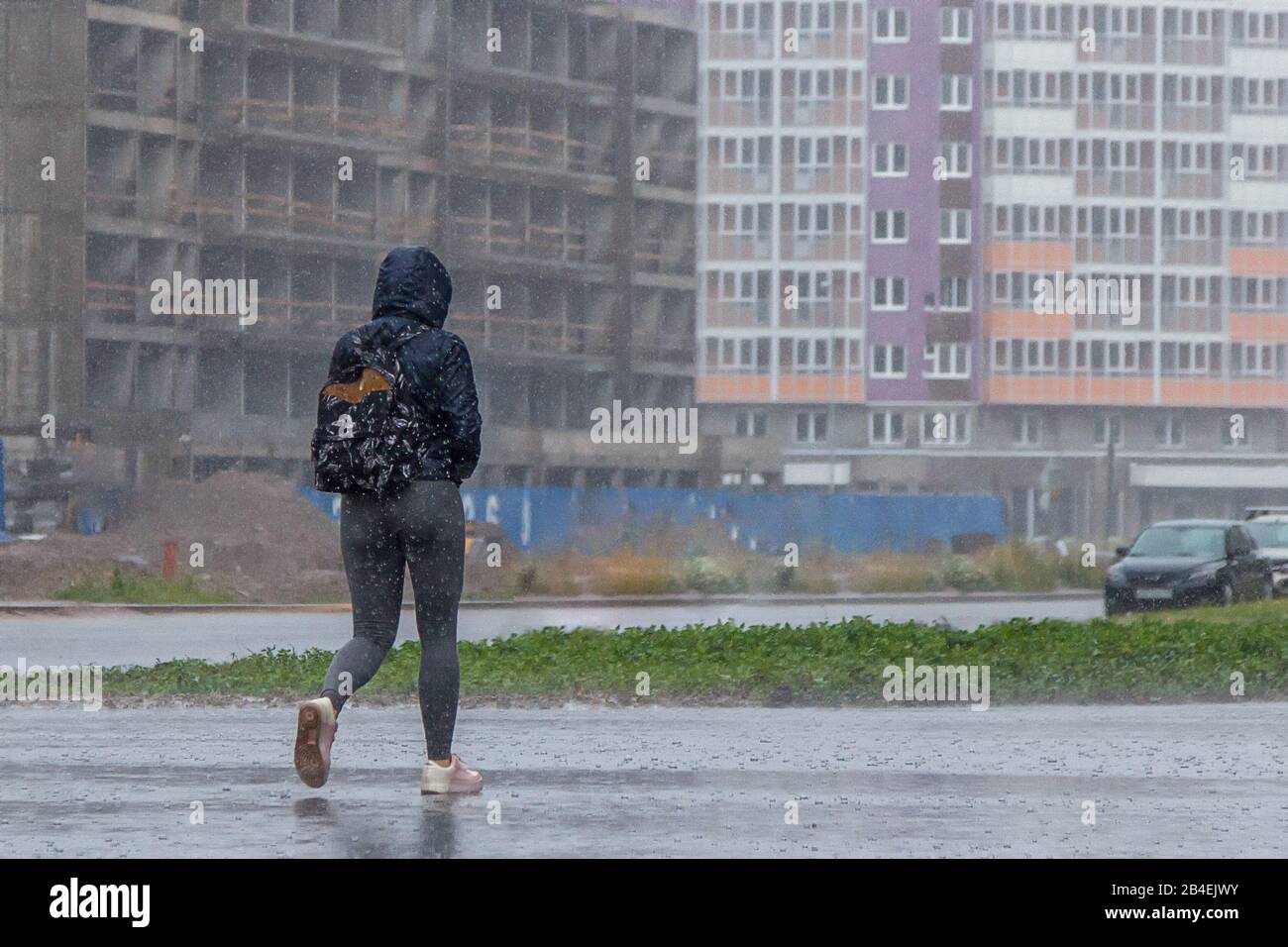 Pouring rain person hi-res stock photography and images - Alamy