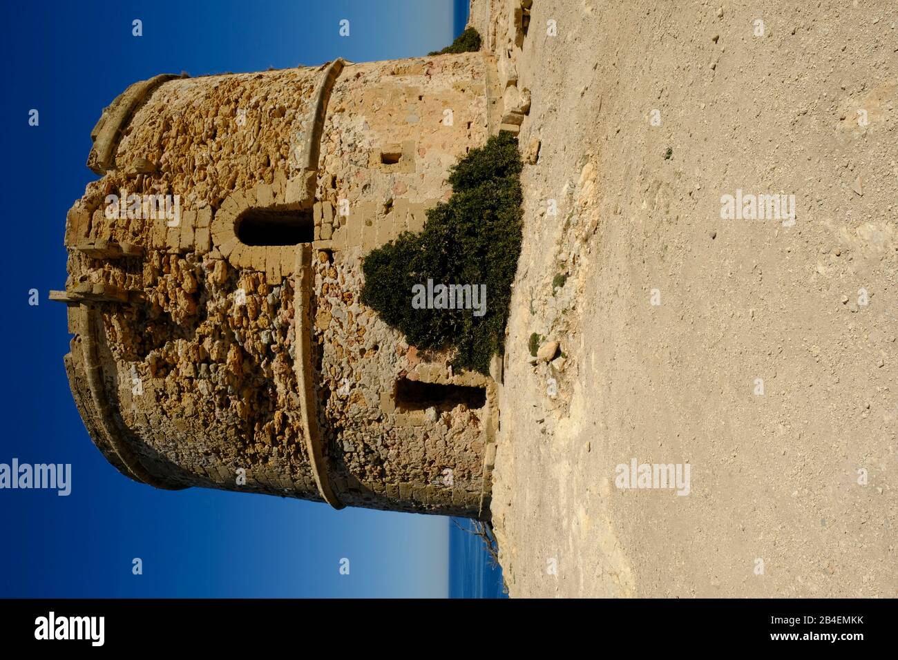 The watchtower Torre d'Albarca on the peninsula Llevant in the natural ...