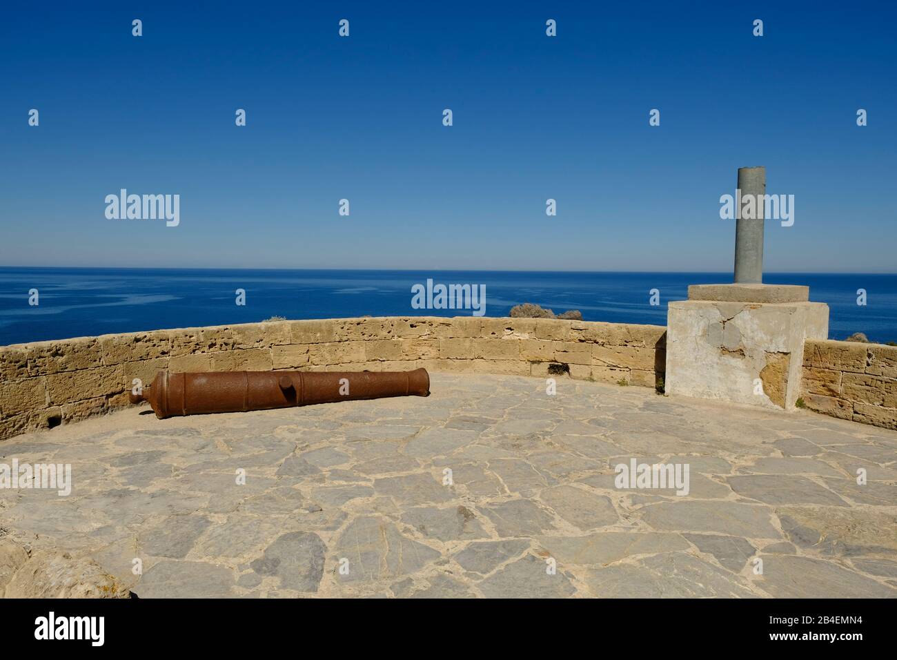 The watchtower Torre d'Albarca on the peninsula Llevant in the natural ...