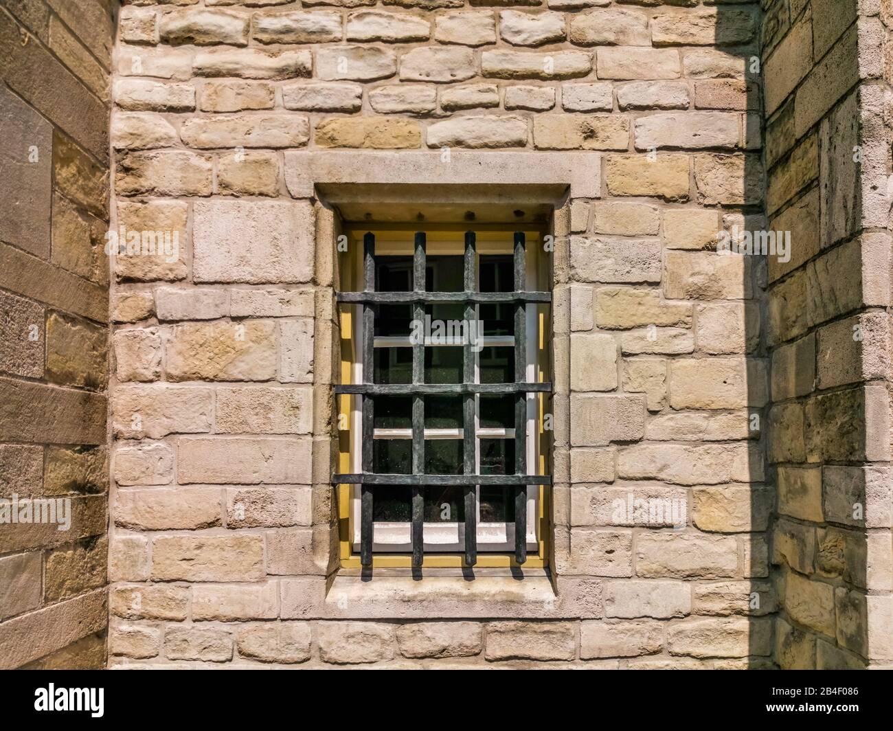 Vintage Wall with barred window, classical jail architecture, Prison ...