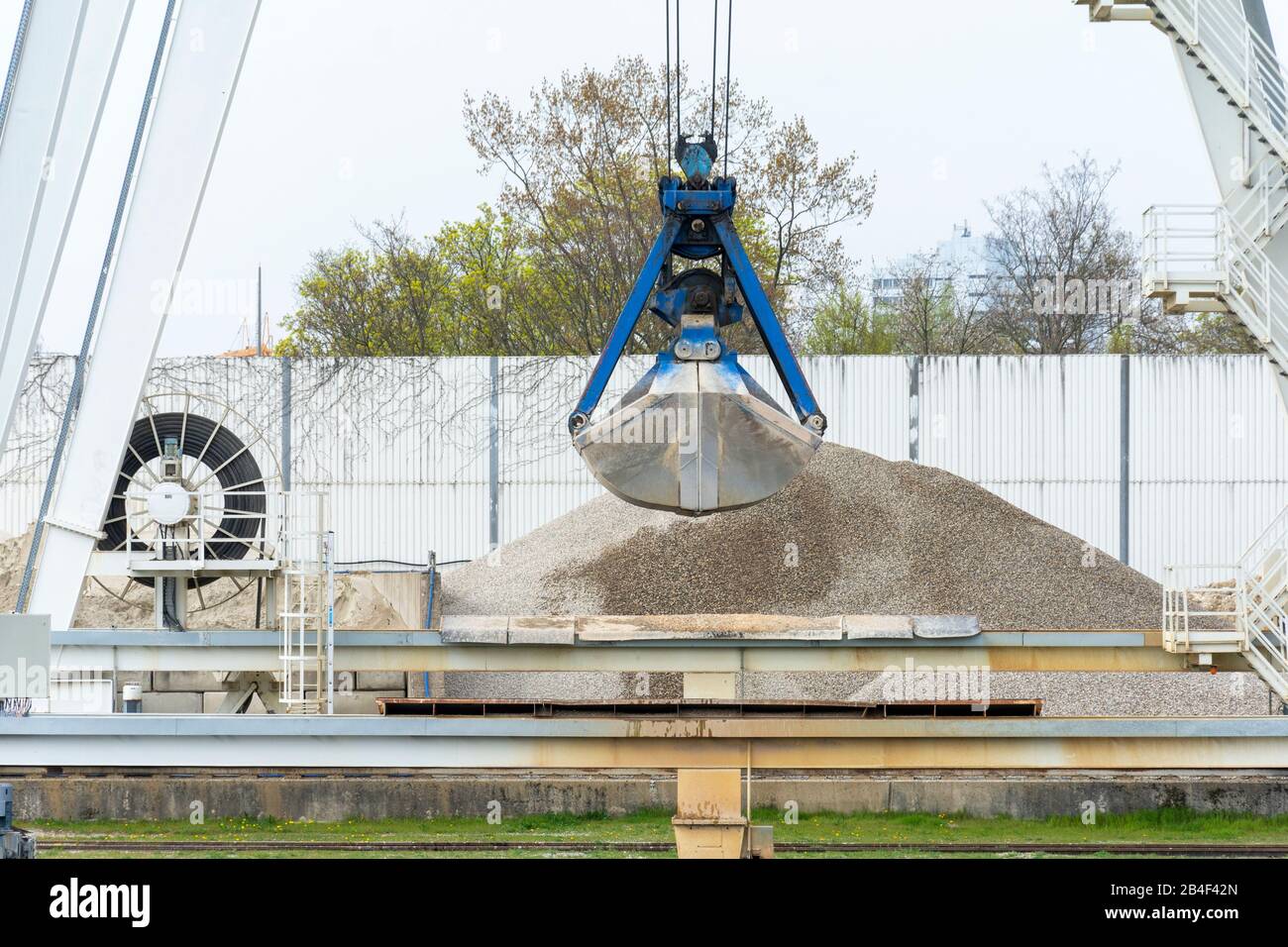 Excavator bucket at a gravel warehouse hi-res stock photography and ...