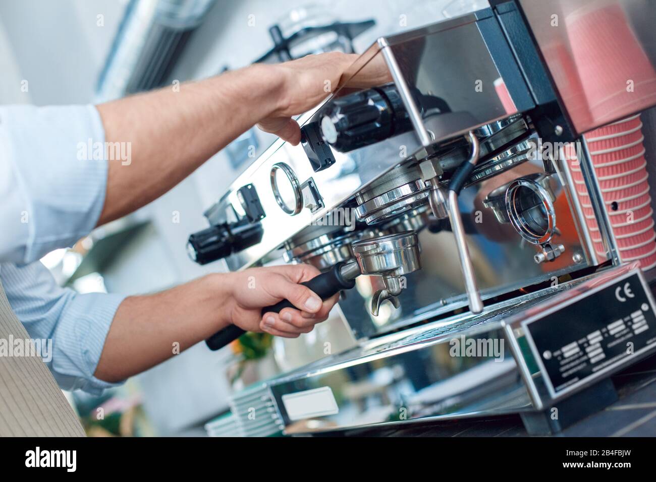 Barista espresso machine making man employee worker working hi-res ...
