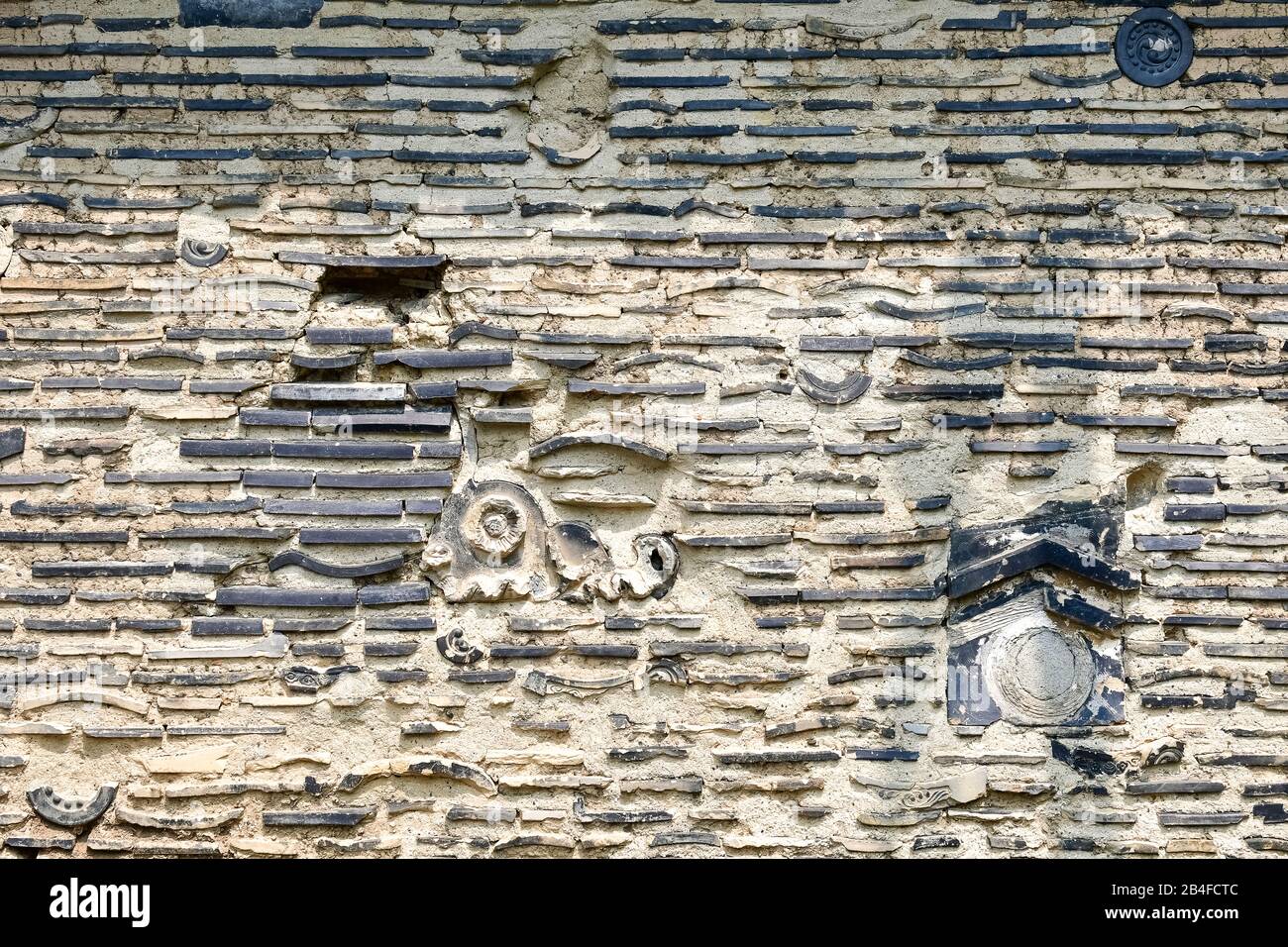 Brick wall with ceramic detailing, Arishiyama, Kyoto, Honshu, Japan ...