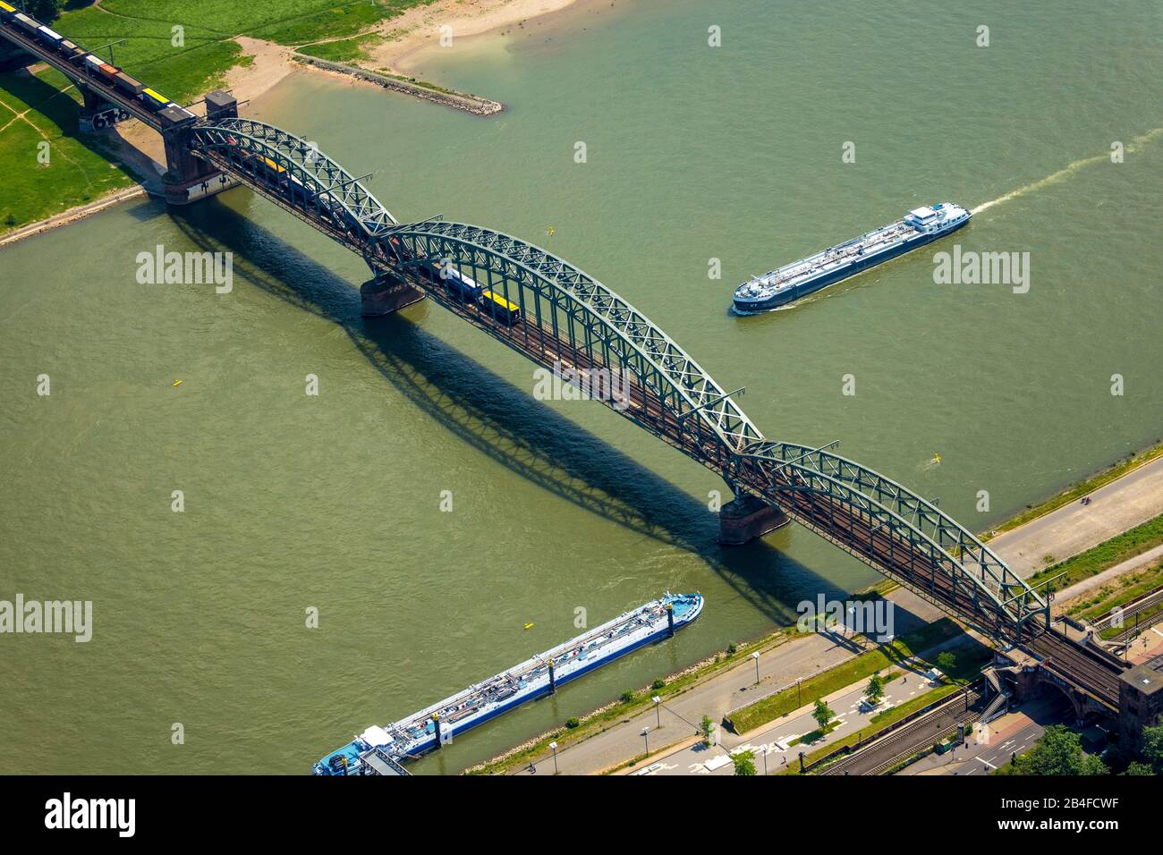 Aerial view of the bridge over the Rhine, south bridge with cargo ships ...
