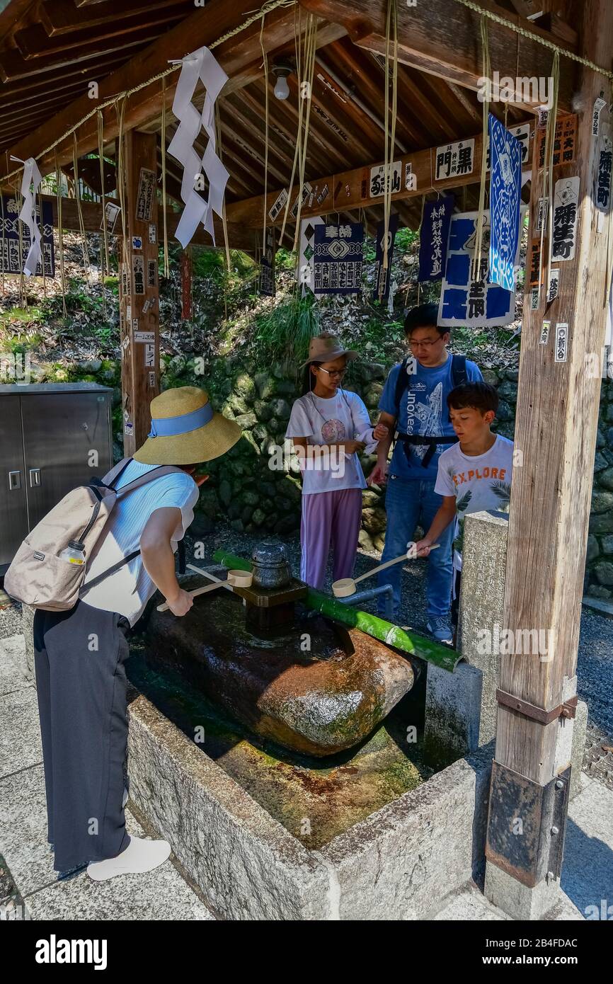 Ritual fountain, Fushimi Inari Shrine, Kyoto, Honshu, Japan Stock Photo ...