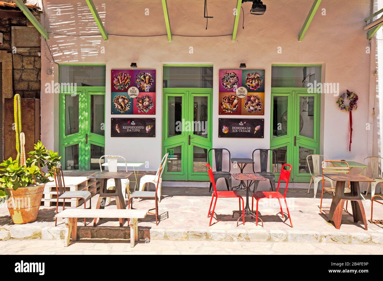 Empty terrace of an ice cream shop in gialova hi-res stock photography ...