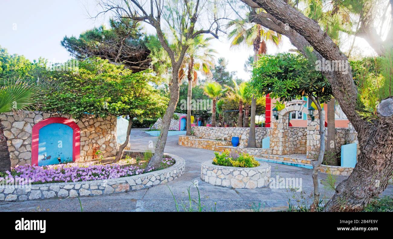 Rustic stone walls in the driveway of the campsite Aginara Beach ...