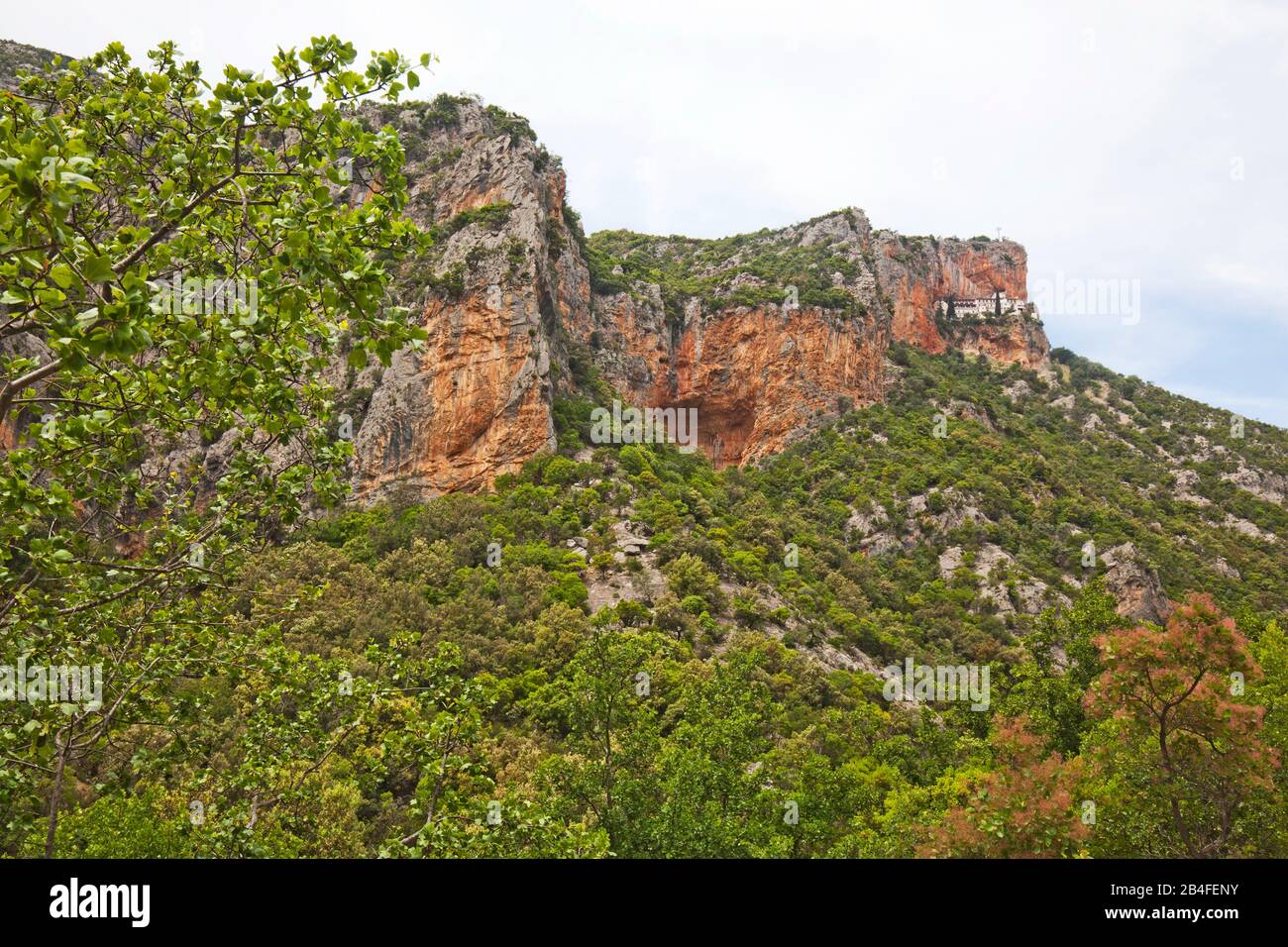 The elonis monastery on the rugged cliffs of the mountains hi-res stock ...