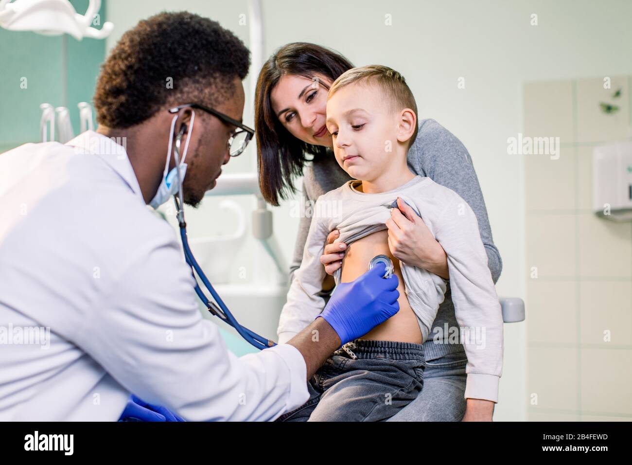 Doctor Using Stethoscope On Child