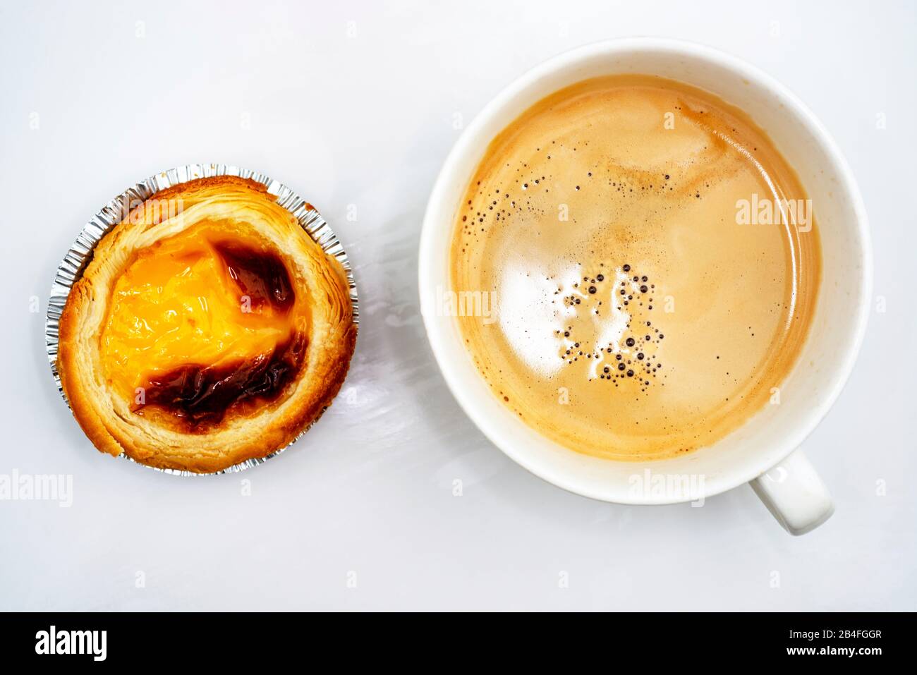 Coffee and custard tart Stock Photo - Alamy