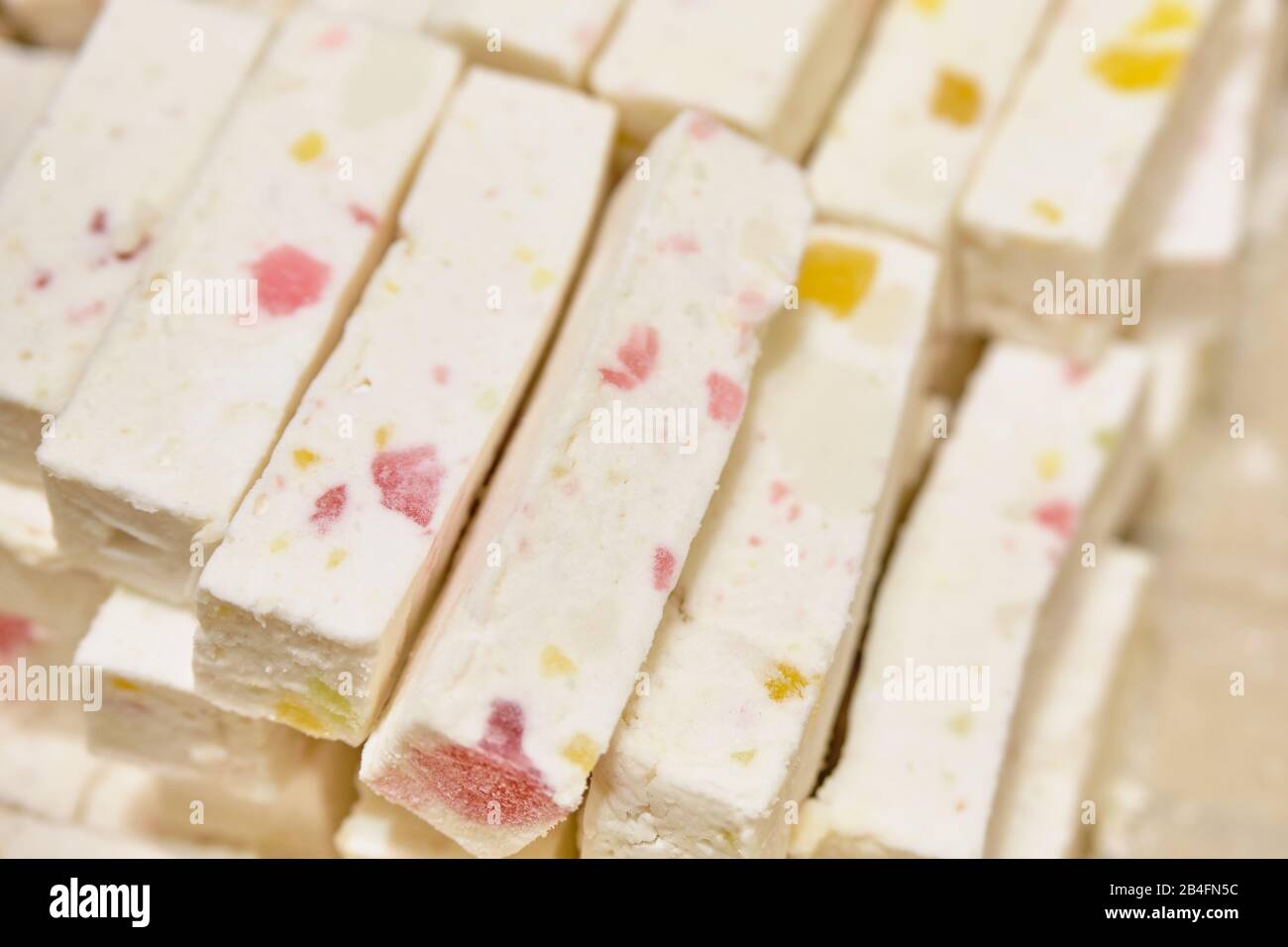 Background and texture of marshmallows sweets with dried fruits. Close ...