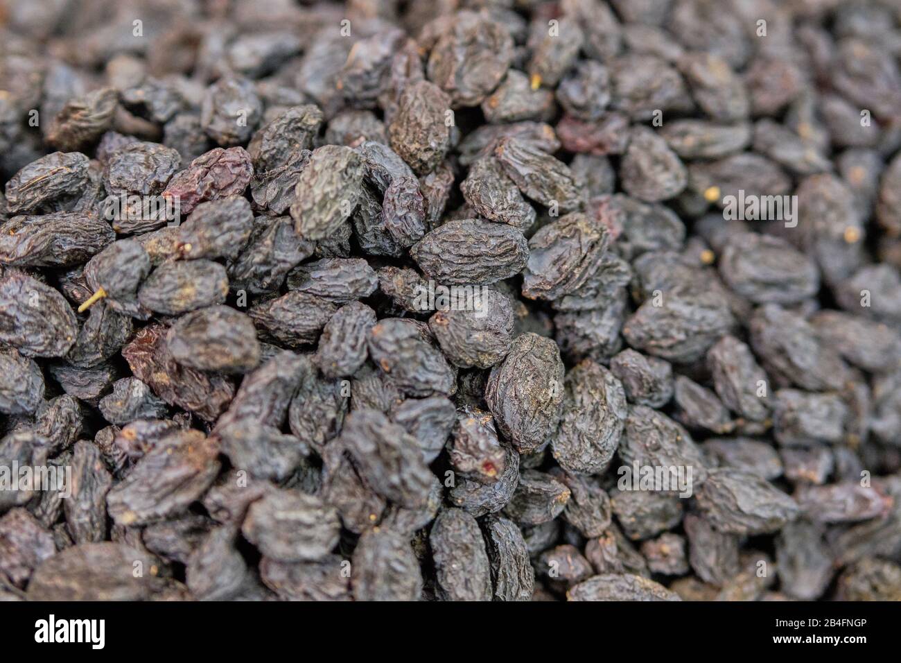 Raisins black texture hi-res stock photography and images - Alamy
