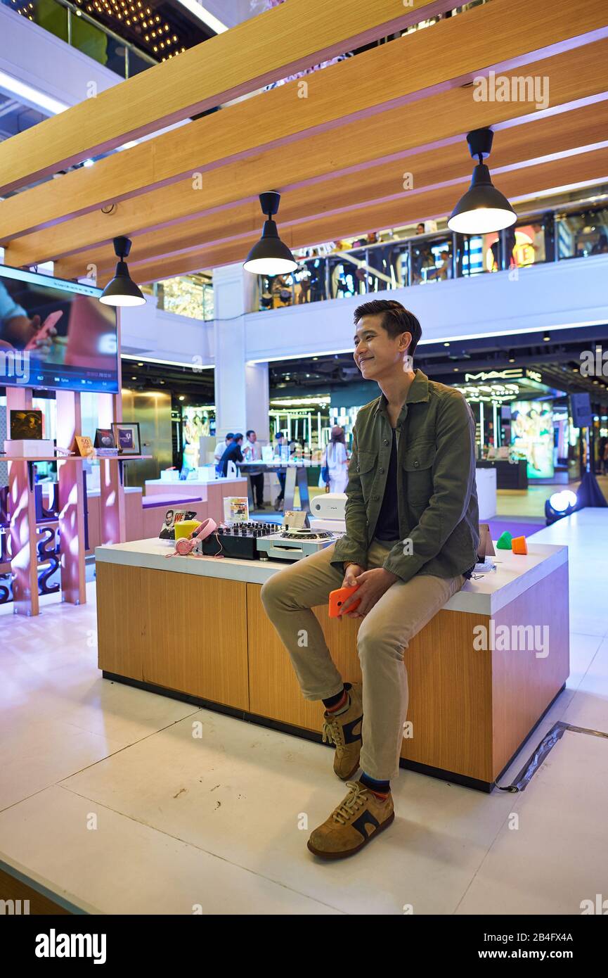 BANGKOK, THAILAND - JUNE 21, 2015: a man posing at Siam Center. Siam ...