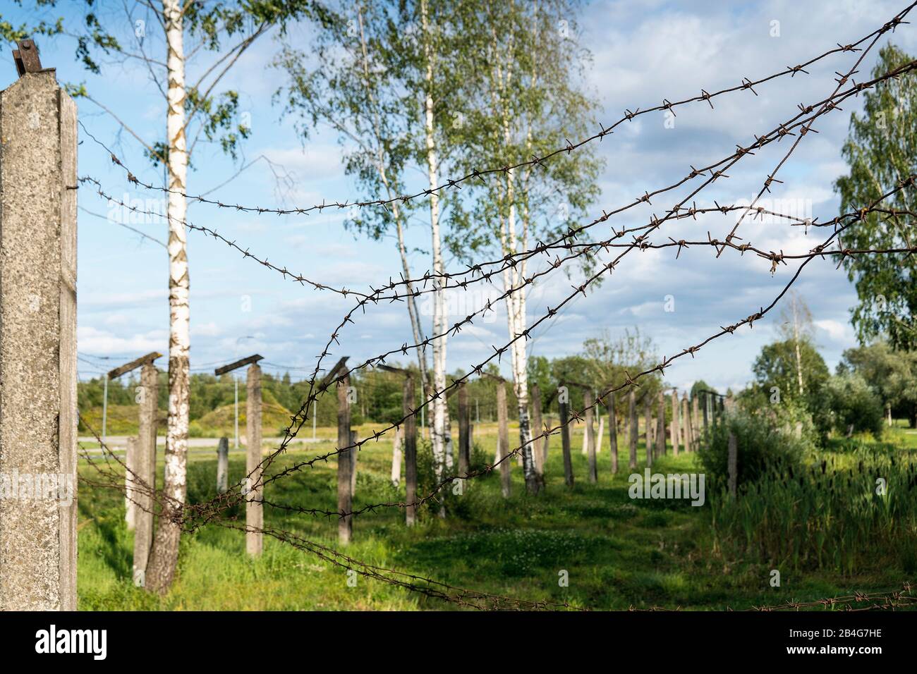 Estonia, Tartu, former Soviet nuclear missile base, barbed wire fence ...