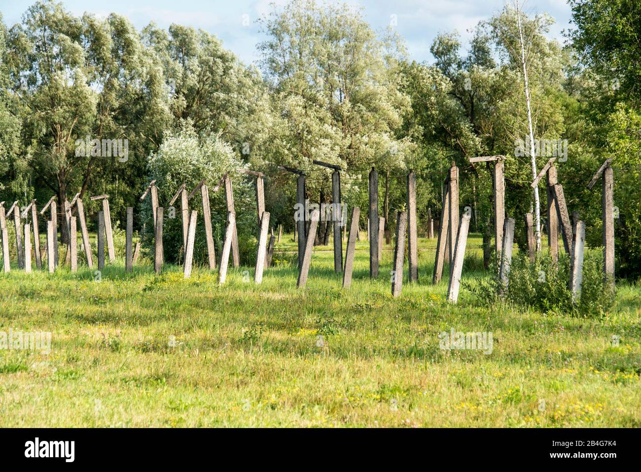 Estonia, Tartu, former Soviet nuclear missile base, barbed wire fence ...
