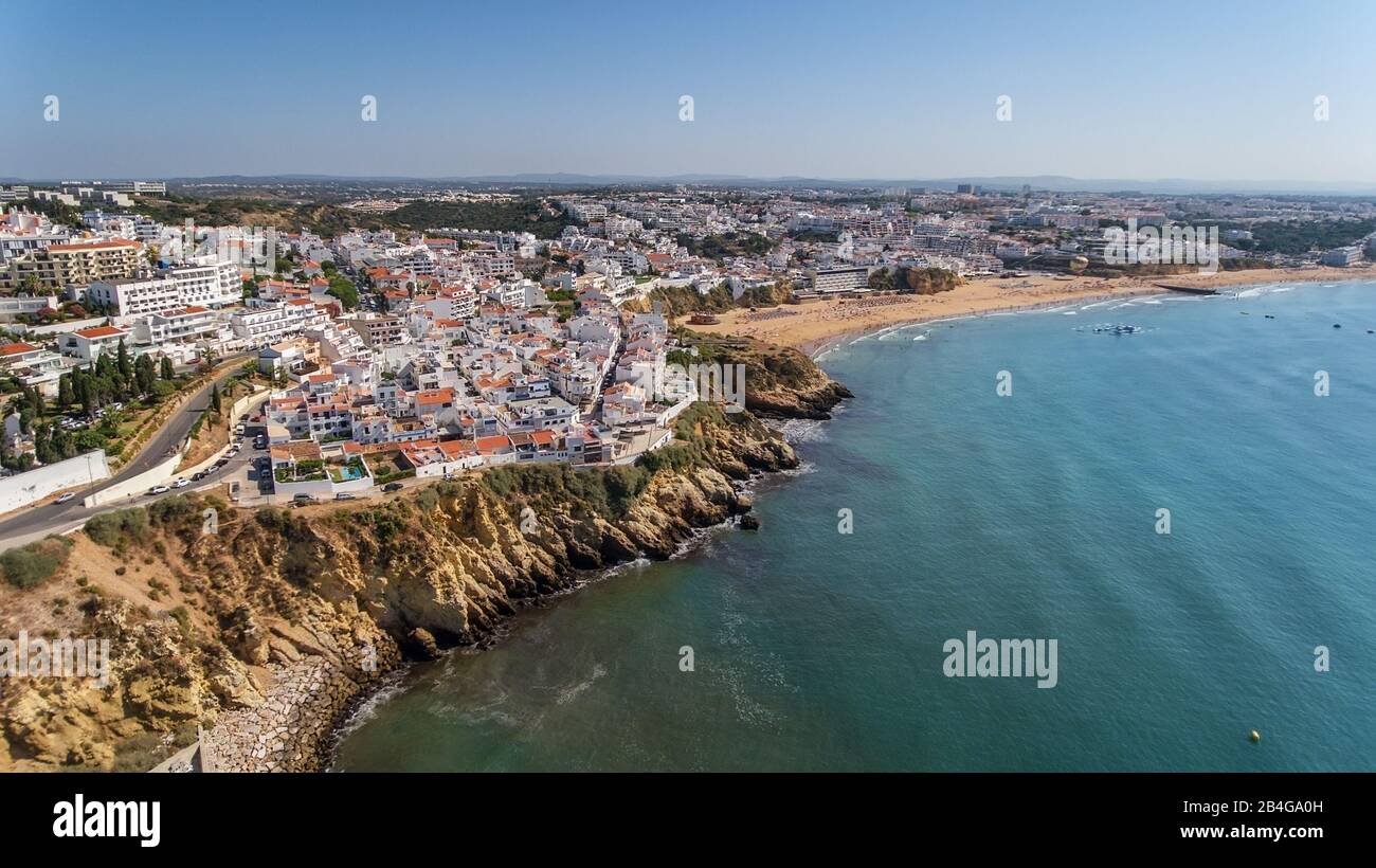 Aerial view of city of Albufeira, beach pescadores, in the south of ...