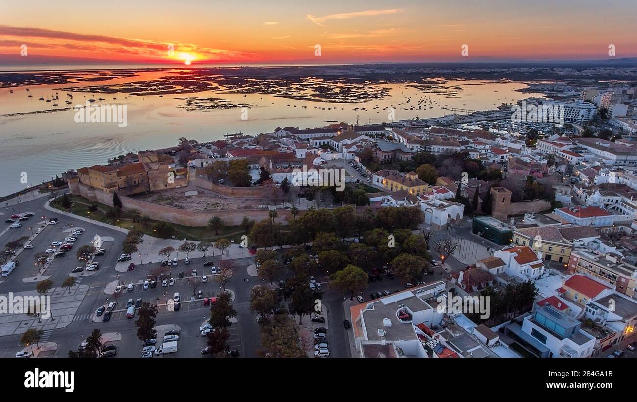 Aerial. Sunset over the old town of Faro, view from the air, Portugal ...