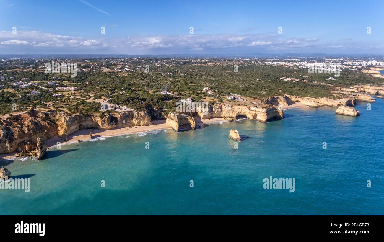 Aerial. Beautiful Portuguese beaches Marinha, Albufeira view from the ...