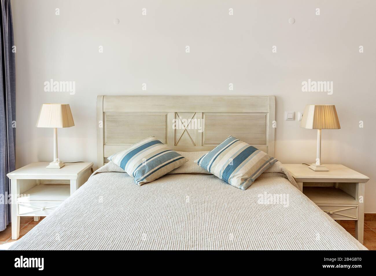 Bedroom in modern style with bed and pillows. Front view Stock Photo ...