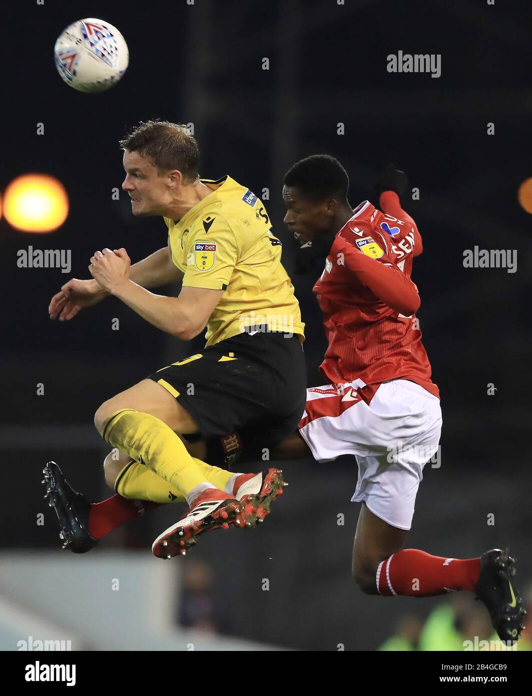 Millwall's Matt Smith (left) and Nottingham Forest's Alfa Semedo battle ...