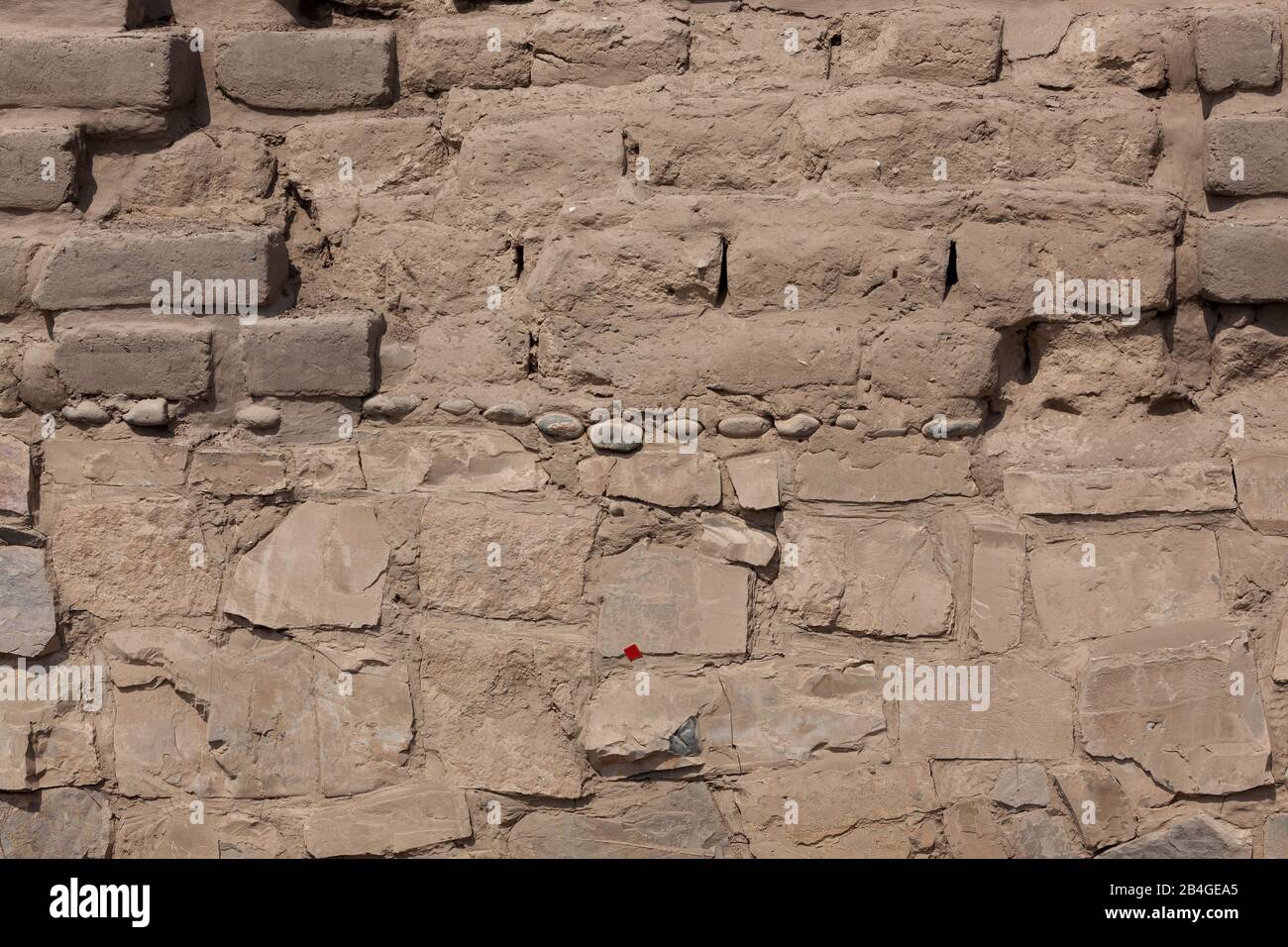 Mud brick and rock construction in Pachacamac, Lima. With restoration ...