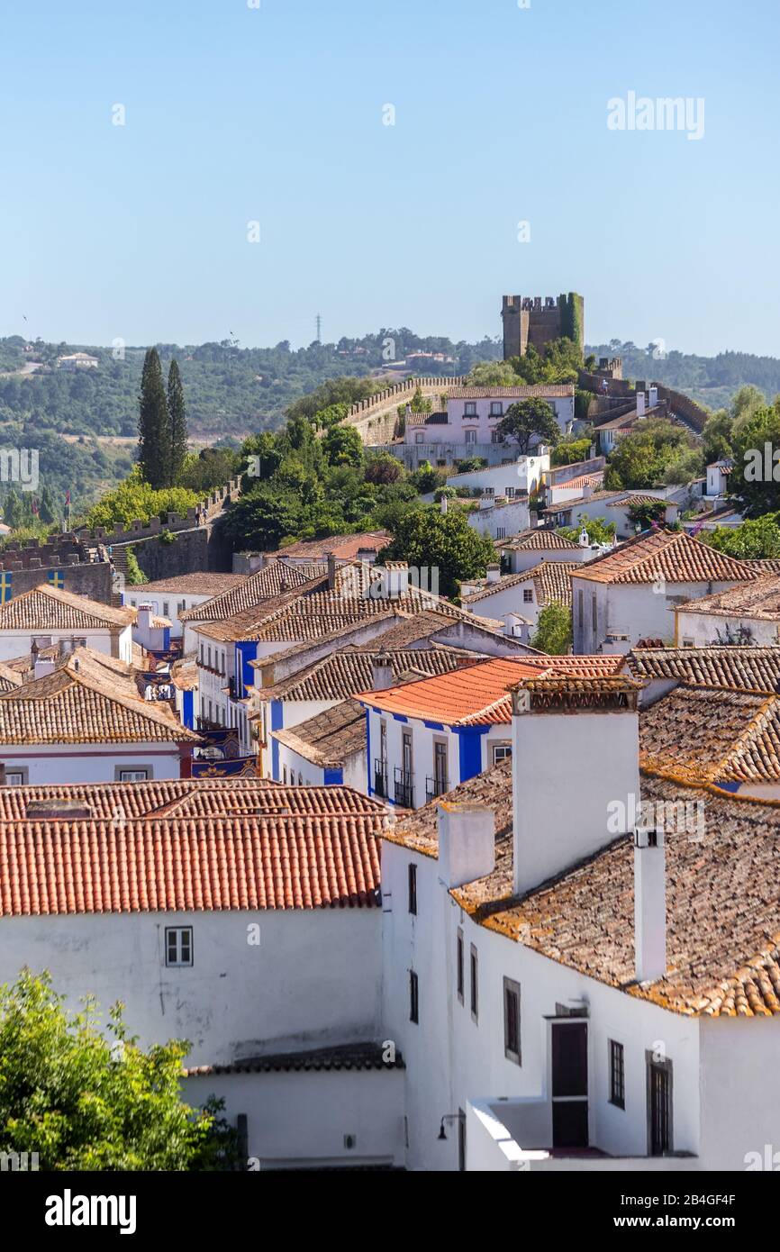 The ancient streets and houses of the Portuguese village of Obidos ...