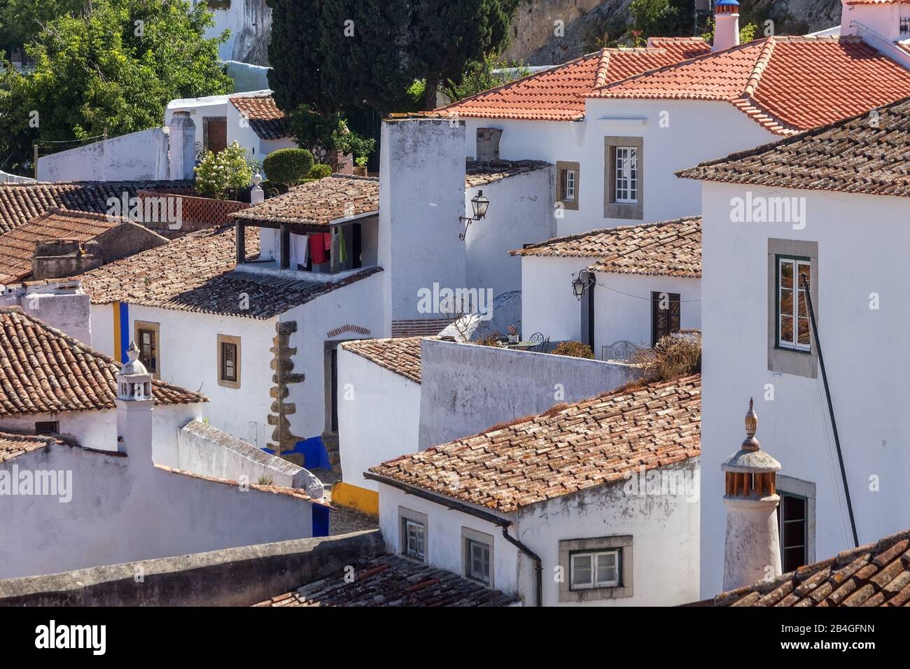The ancient streets and houses of the Portuguese village of Obidos ...